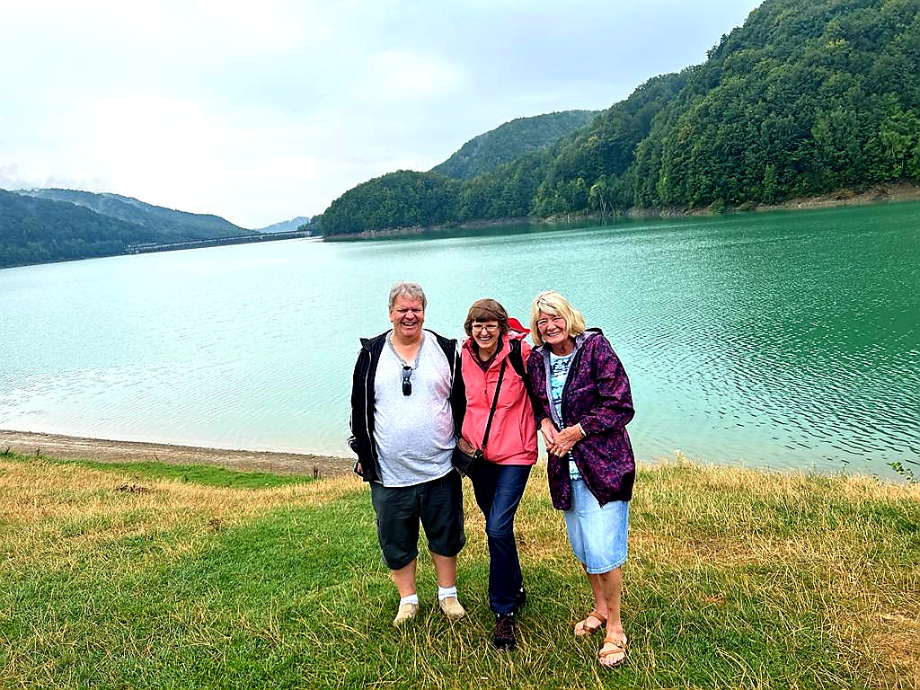 With joyful British visitors at Paltinu Lake, Doftana Valley, Aug. 2022 ...